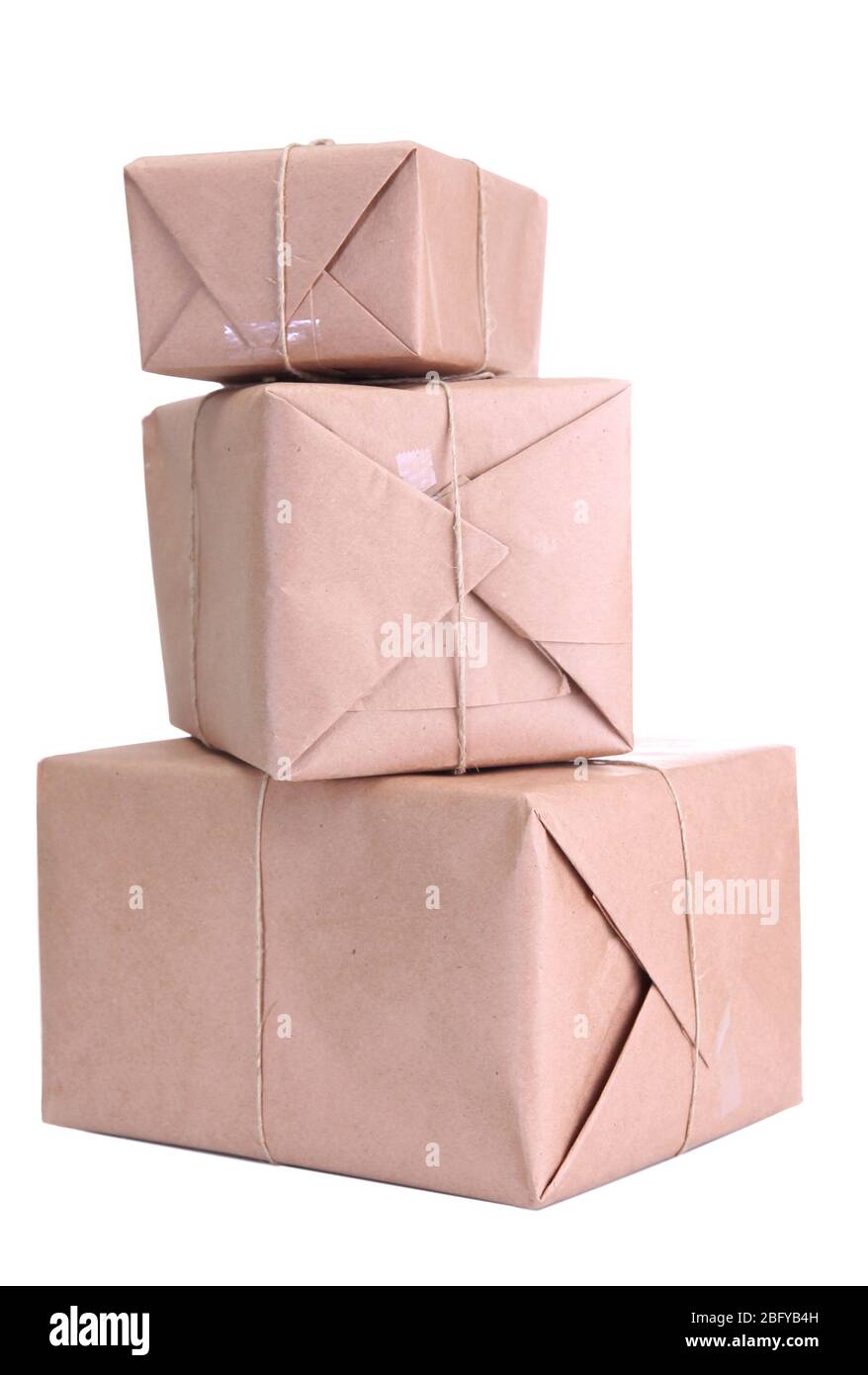 parcels boxes with kraft paper, isolated on white Stock Photo - Alamy