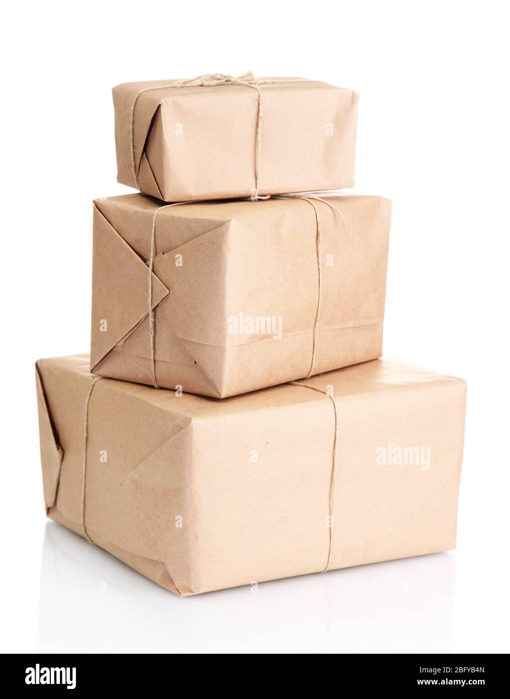 parcels boxes with kraft paper, isolated on white Stock Photo - Alamy
