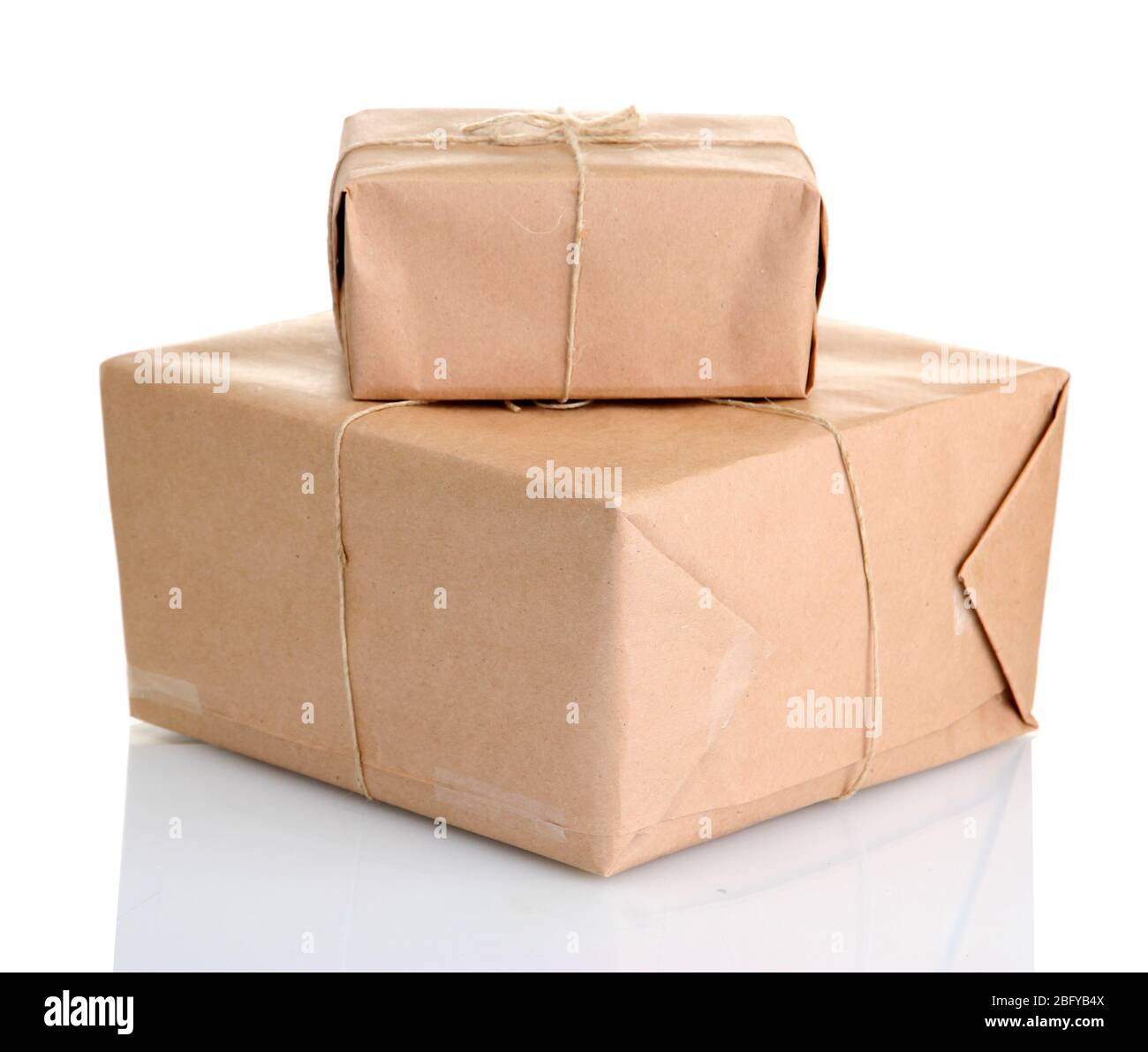 parcels boxes with kraft paper, isolated on white Stock Photo - Alamy