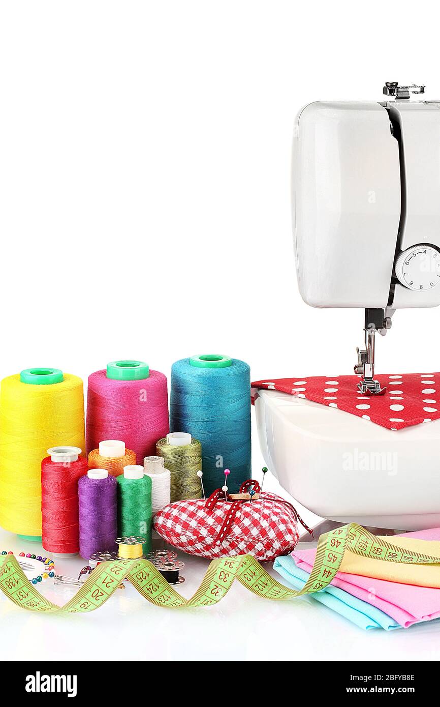 sewing machine and fabric isolated on white Stock Photo - Alamy