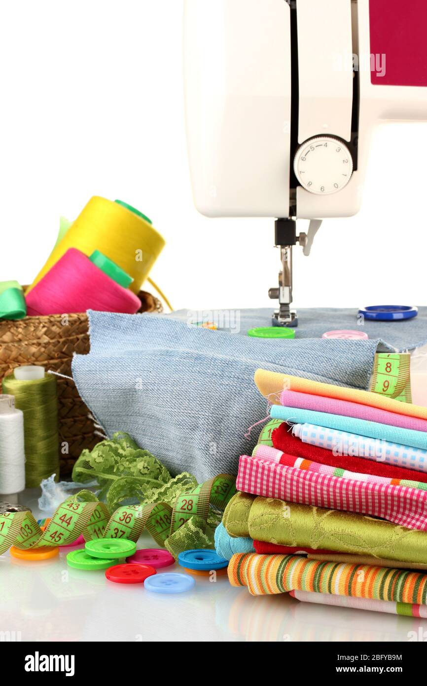 sewing machine and fabric isolated on white Stock Photo - Alamy