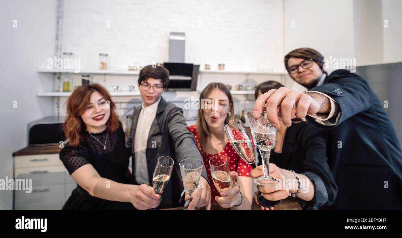 Happy colleagues in office celebrate special event Stock Photo - Alamy