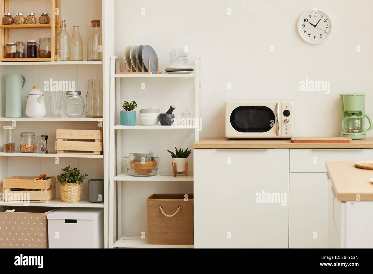 Warm toned background image of white kitchen interior with minimal ...