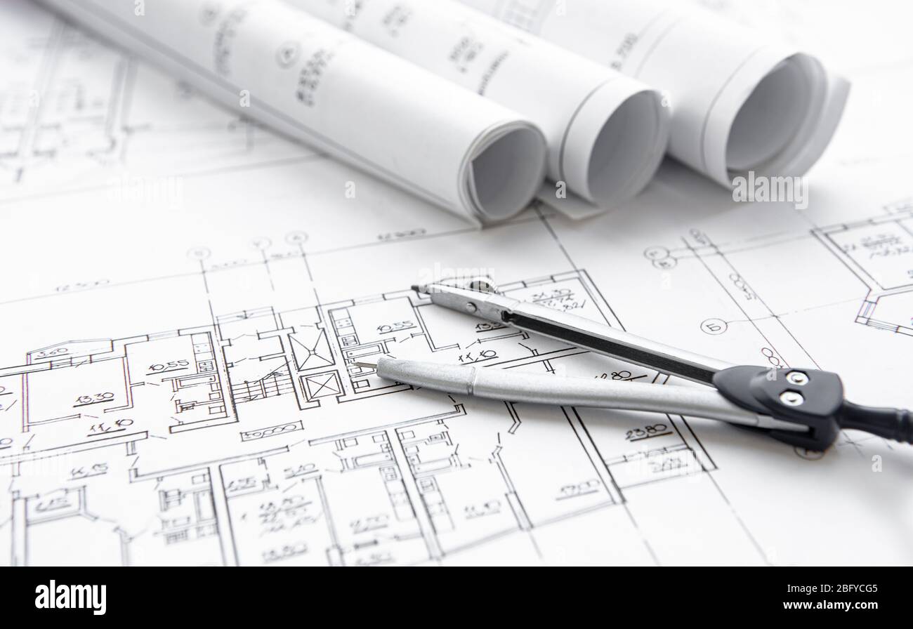 Architect workplace top view. Architectural project, blueprints ...
