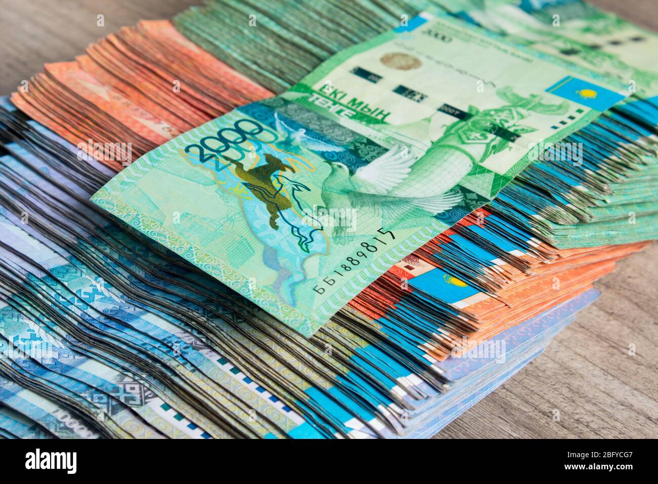 Kazakhstan tenge currency note sign hi-res stock photography and images ...
