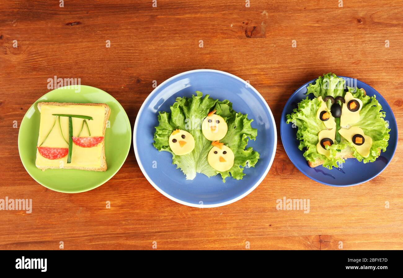 fun food for kids on wooden background Stock Photo - Alamy