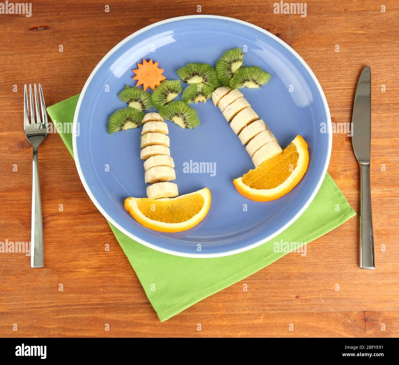 fun food for kids on wooden background Stock Photo - Alamy