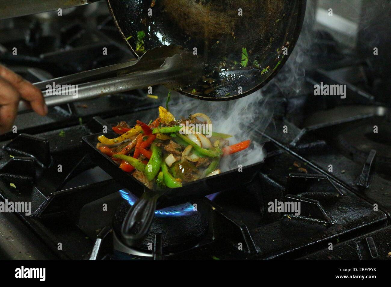 Sizzling mexican restaurant dish hi-res stock photography and images ...