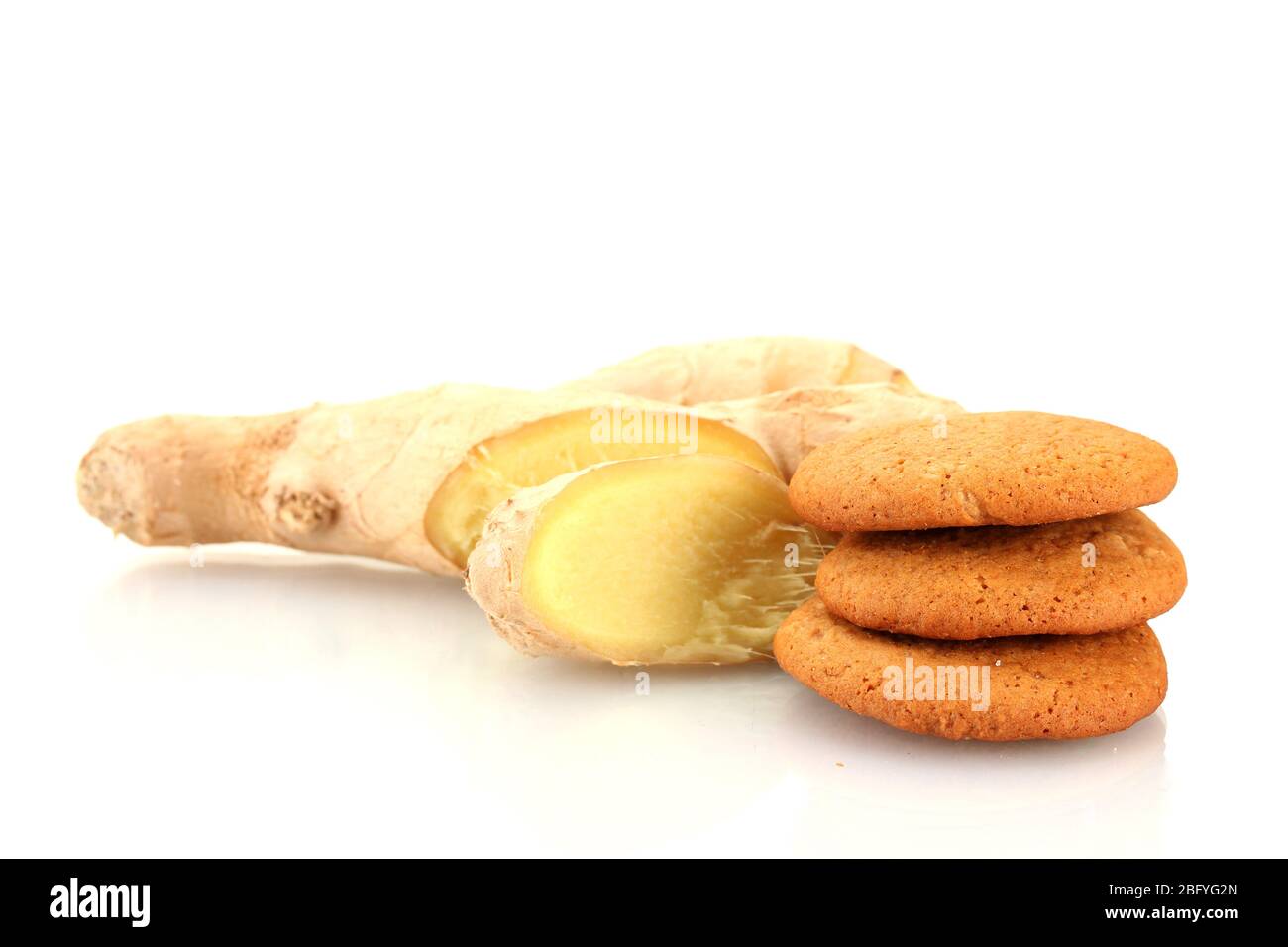 Ginger cookies with fresh ginger root isolated on white Stock Photo - Alamy
