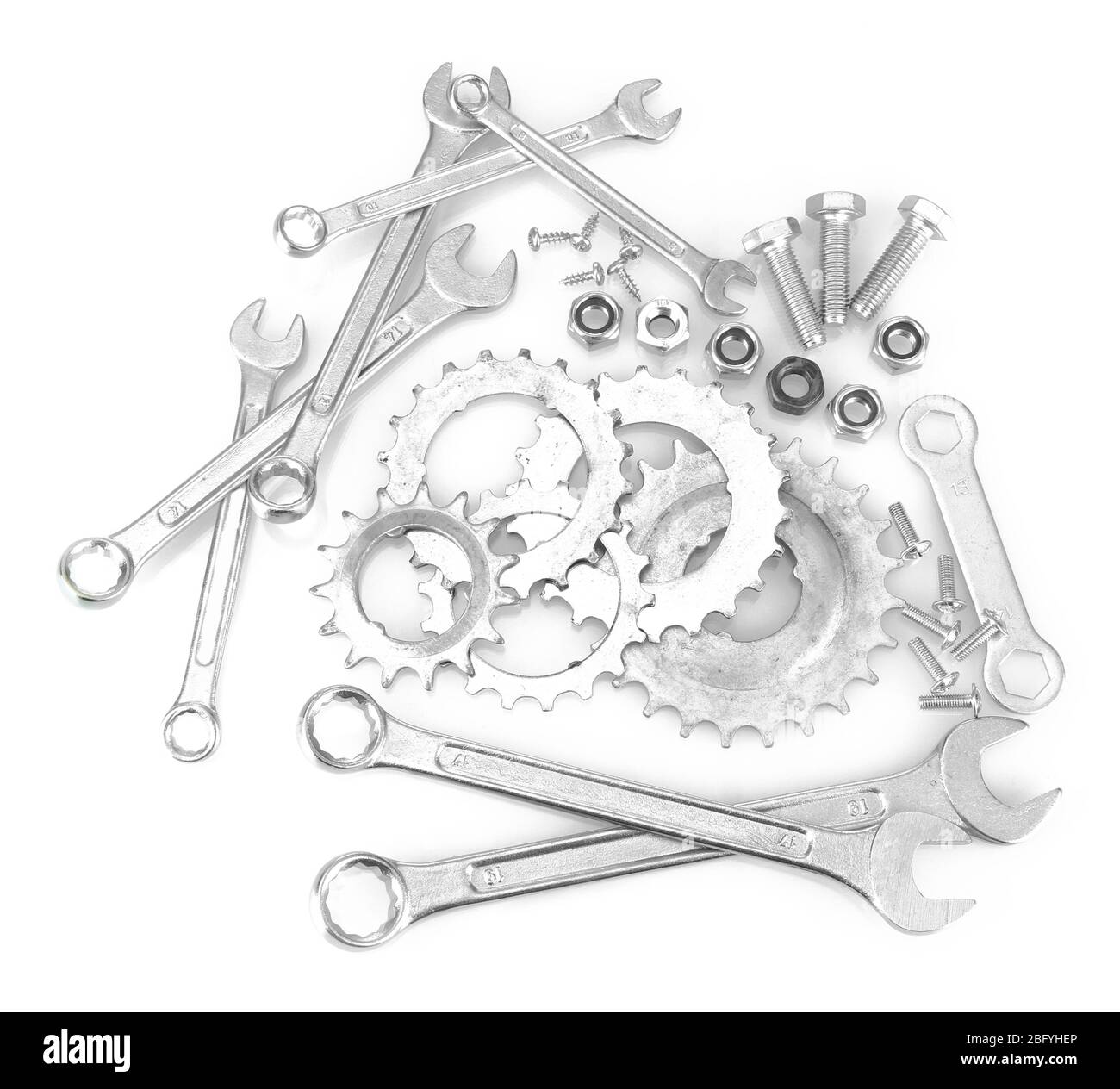 Machine gear, metal cogwheels, nuts and bolts isolated on white Stock ...