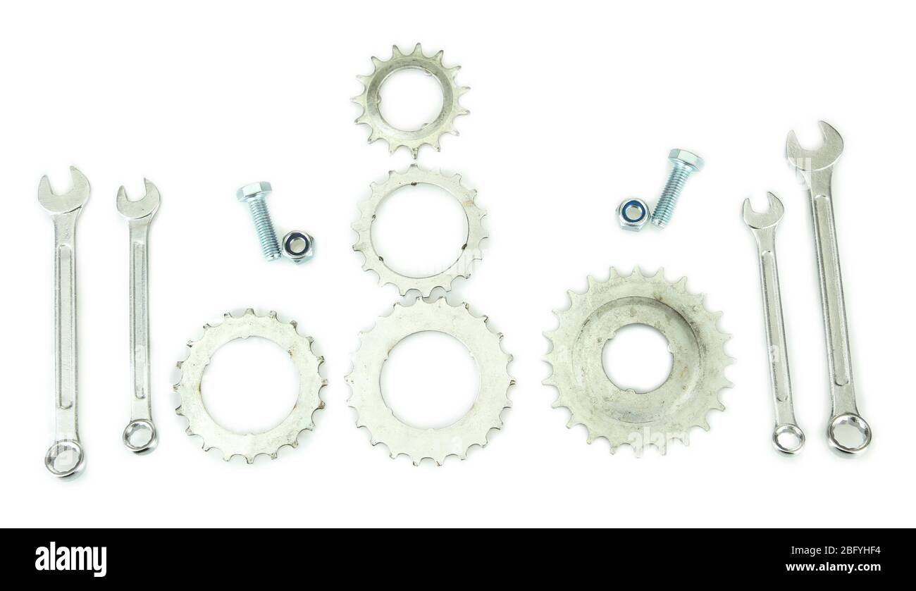 Machine gear, metal cogwheels, nuts and bolts isolated on white Stock ...