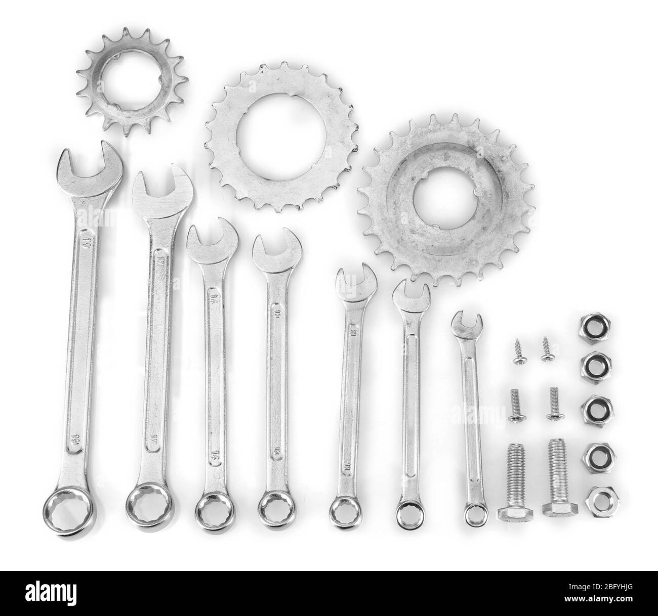 Machine gear, metal cogwheels, nuts and bolts isolated on white Stock ...
