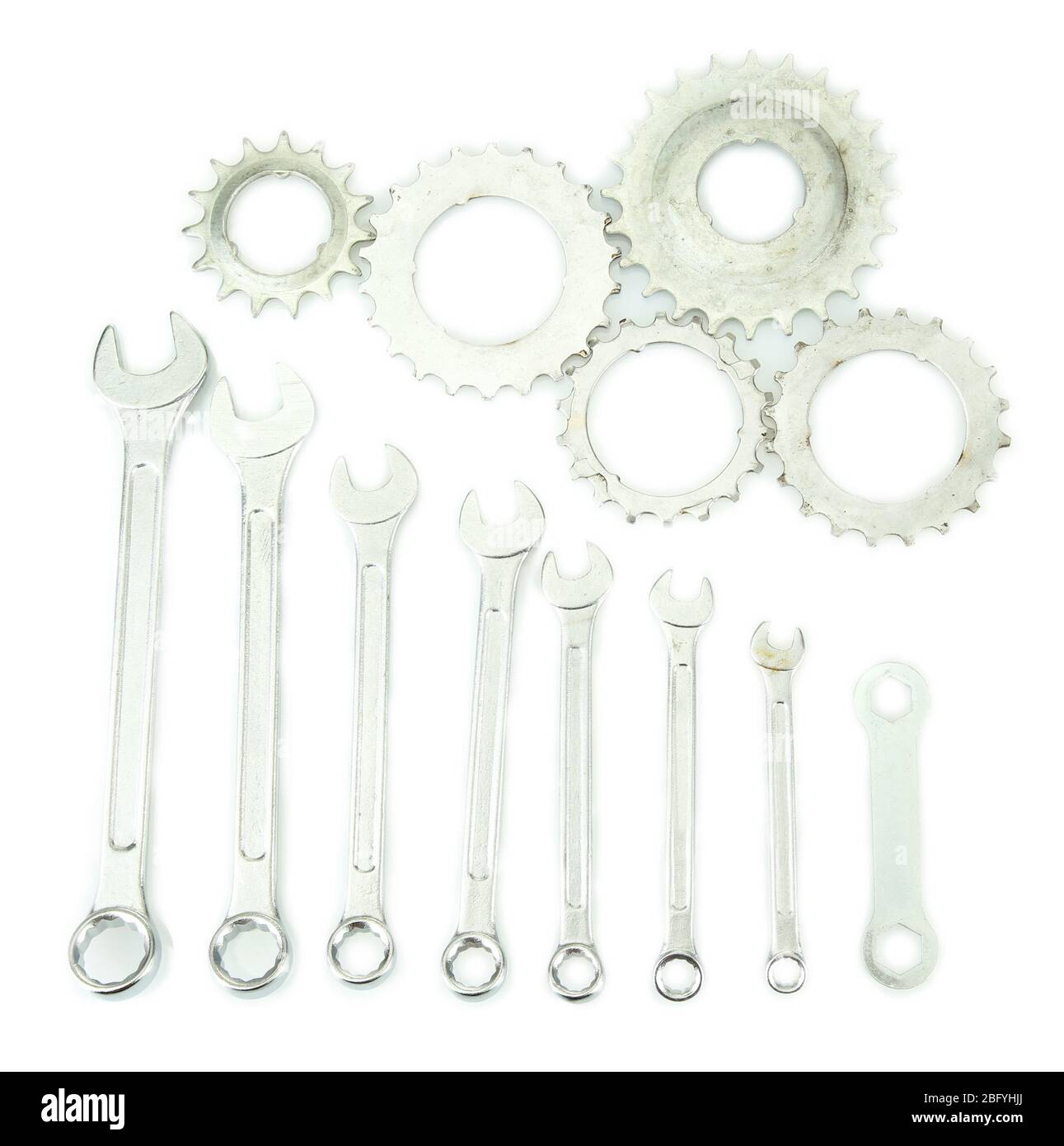 Machine gear, metal cogwheels, nuts and bolts isolated on white Stock ...