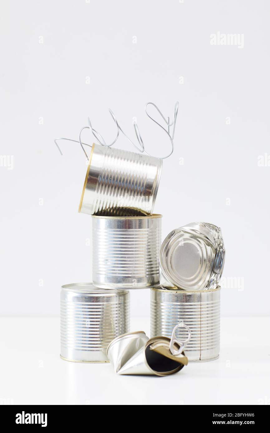 Minimal composition of discarded metal cans isolated on white ...