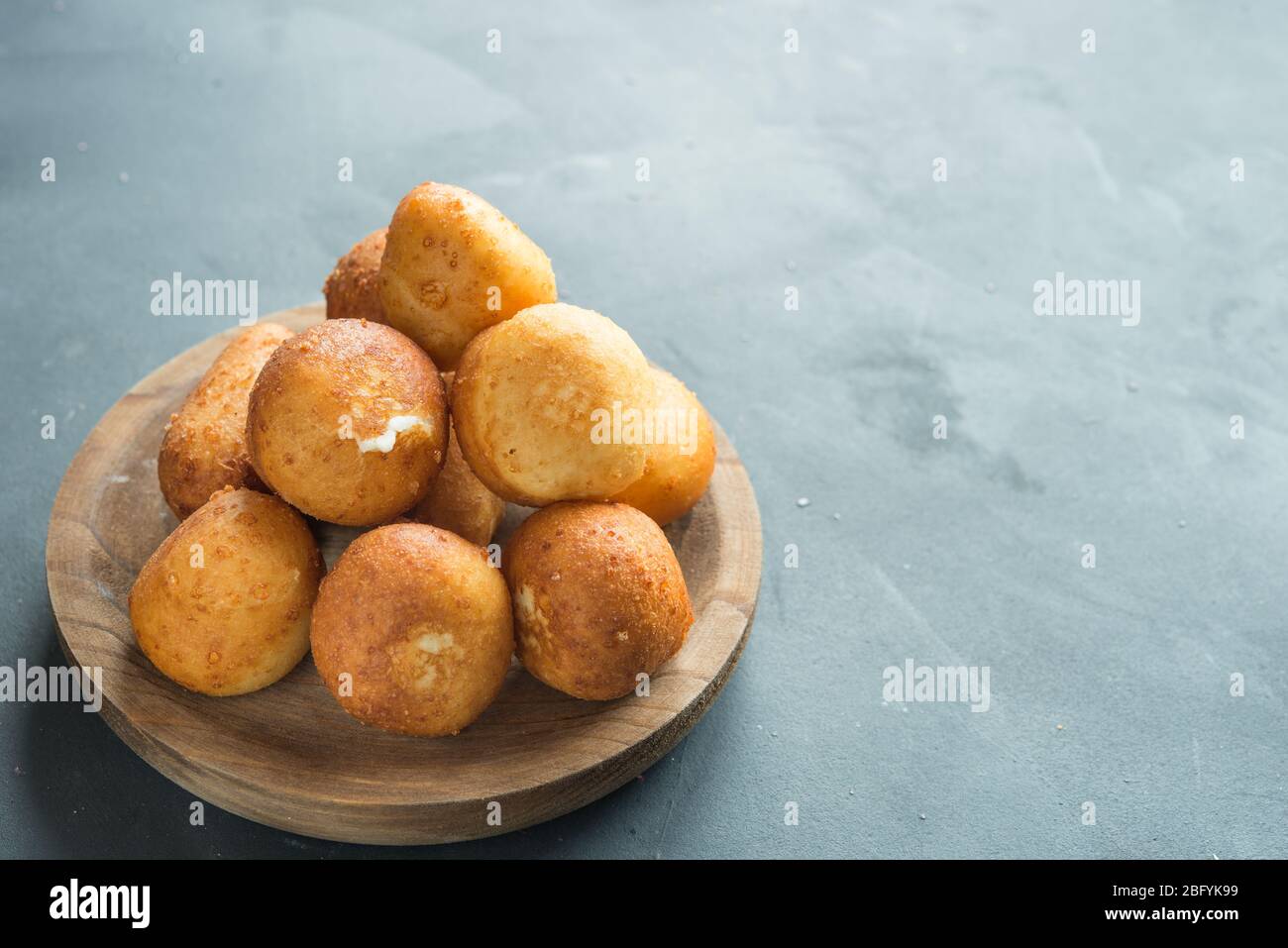 Traditional Colombian buñuelo - Deep Fried Cheese Bread Stock Photo - Alamy