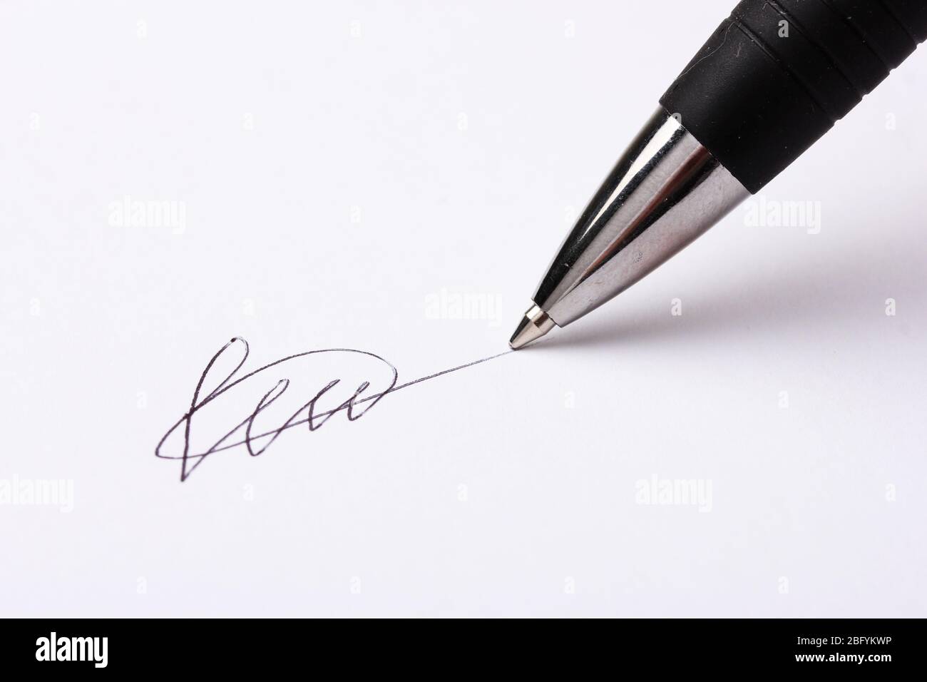 Closeup of signature (fake, not real) and pen, isolated on white Stock ...