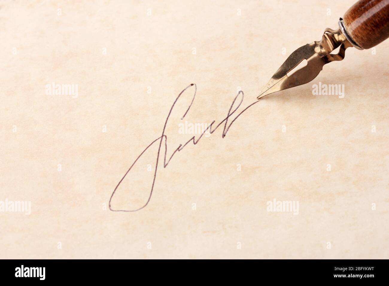 Closeup of signature (fake, not real) and ink pen, on old paper Stock ...