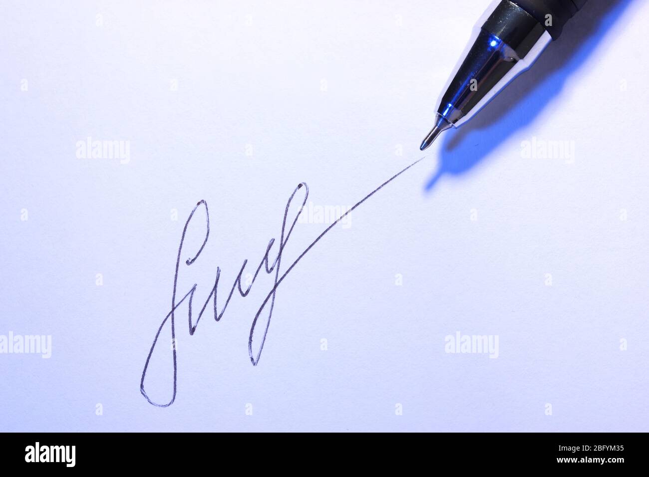 Closeup of signature (fake, not real) and pen, isolated on white Stock ...
