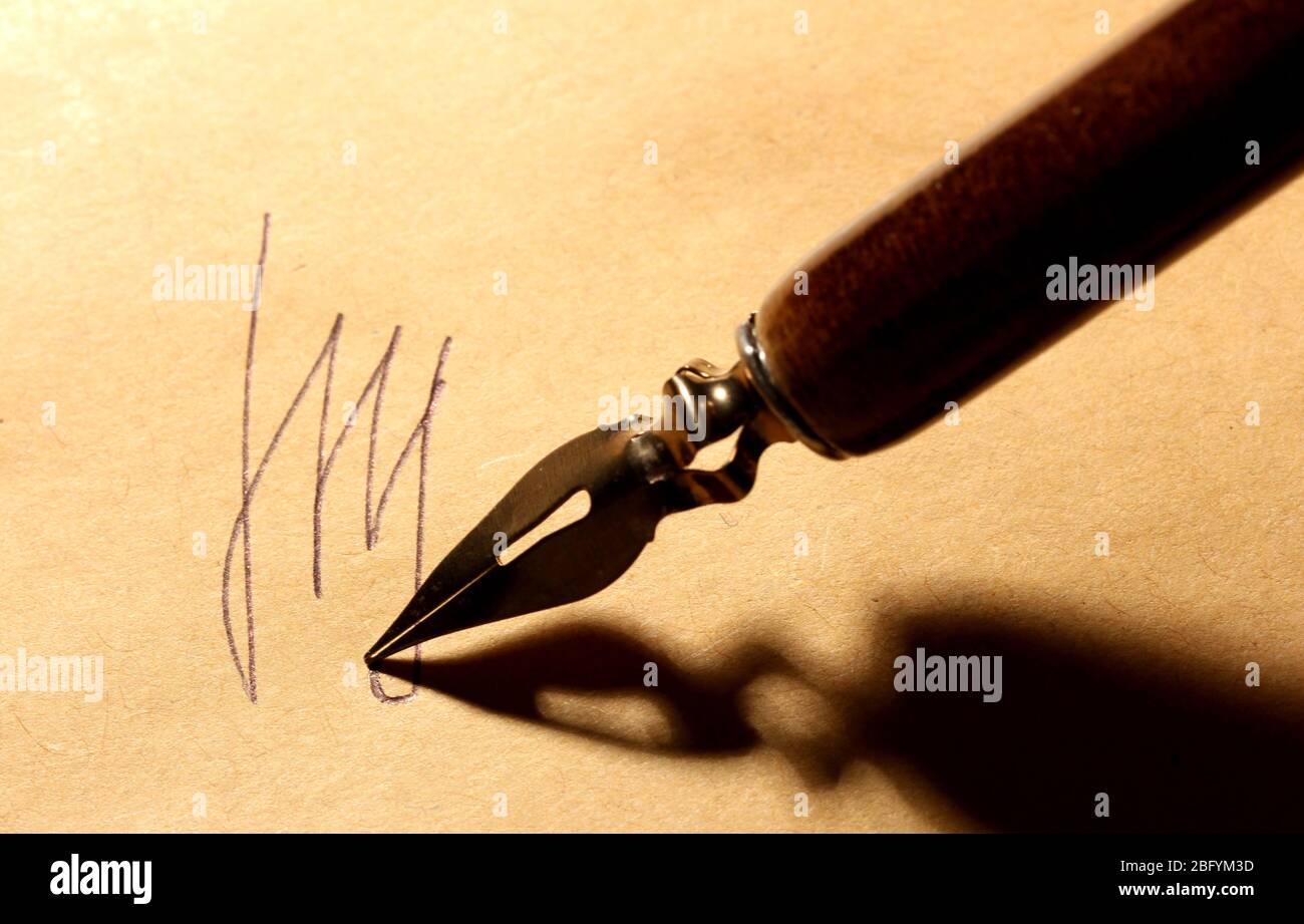 Closeup of signature (fake, not real) and ink pen, on old paper Stock ...
