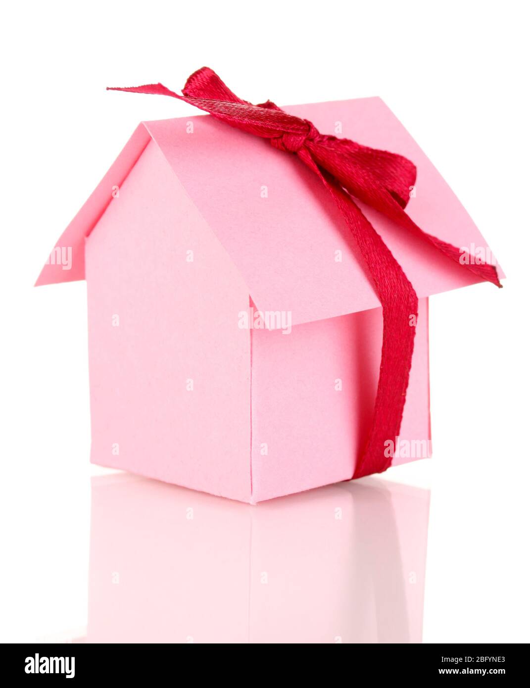 Small house with ribbon isolated on white Stock Photo - Alamy
