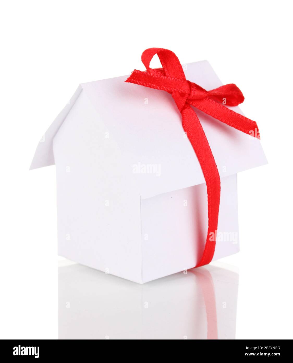 Small house with ribbon isolated on white Stock Photo - Alamy