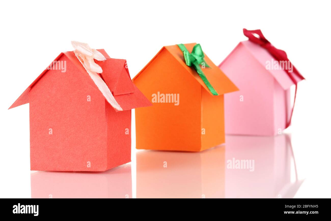 Small houses with ribbons isolated on white Stock Photo - Alamy