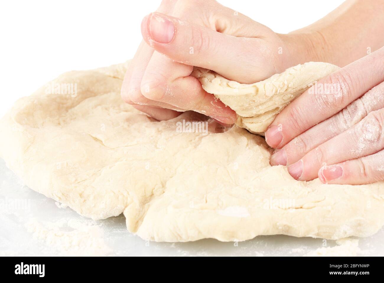 Preparing pizza dough isolated on white Stock Photo - Alamy