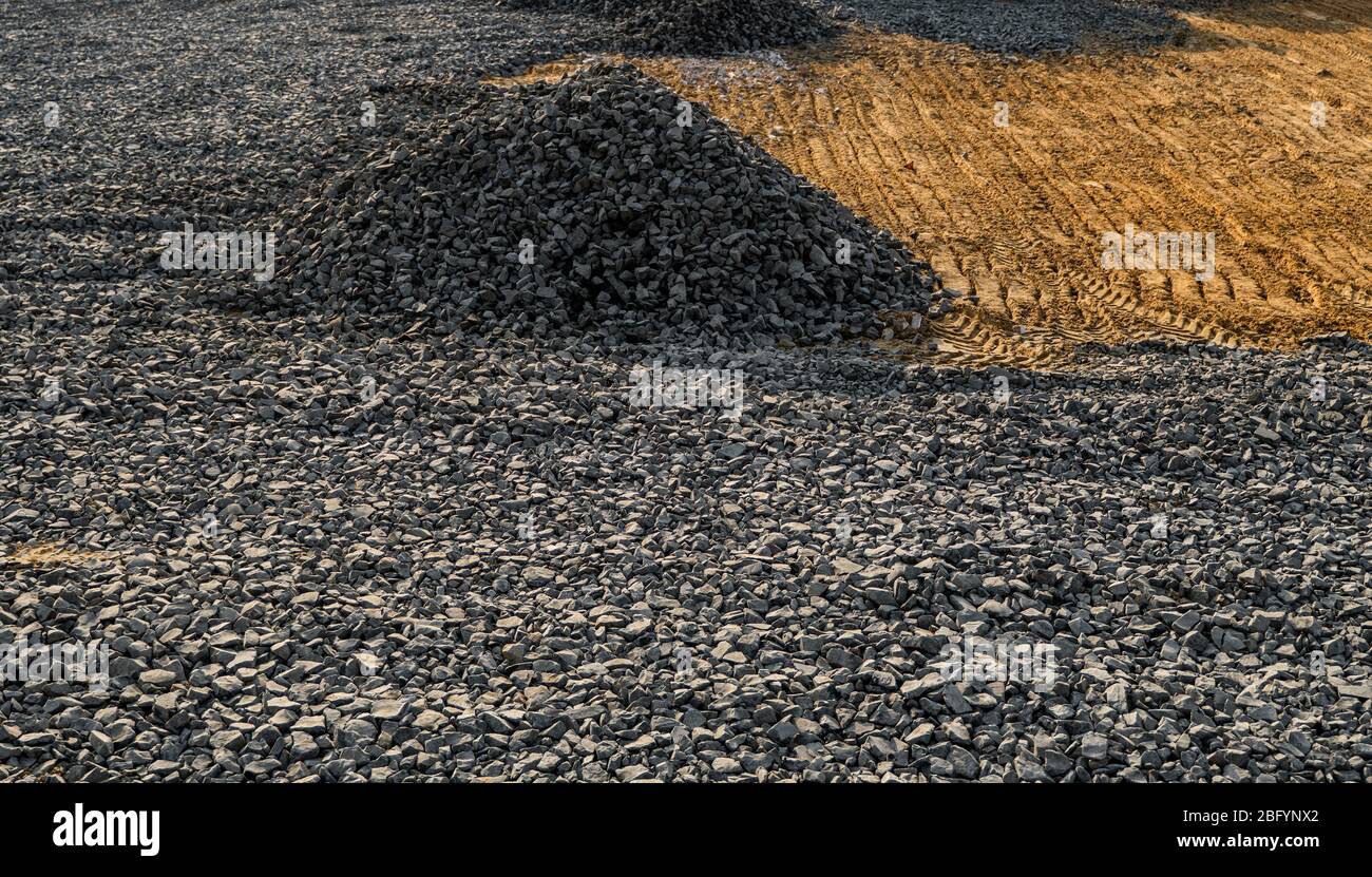 Gravel and sand piles on construction site. Materials for building ...