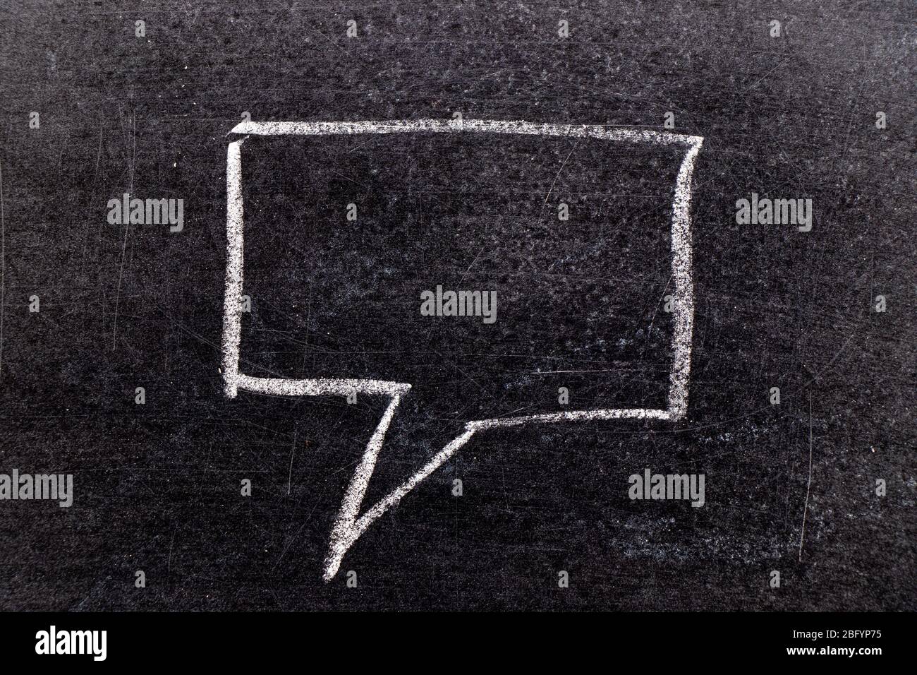 White chalk hand drawing in bubble speech shape with blank space for ...