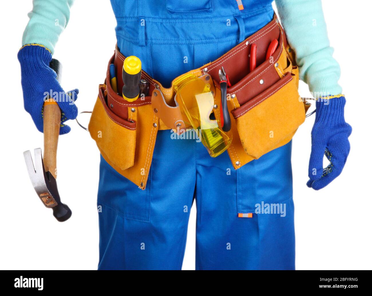 Male builder in blue overalls with gavel isolated on white Stock Photo ...