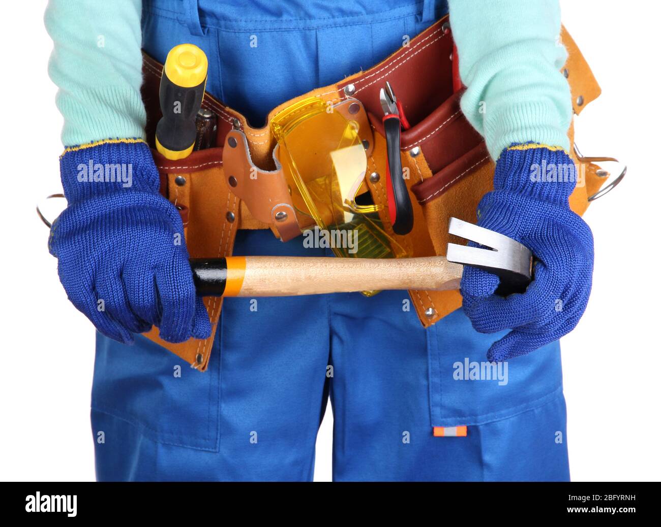 Male builder in blue overalls with gavel isolated on white Stock Photo ...