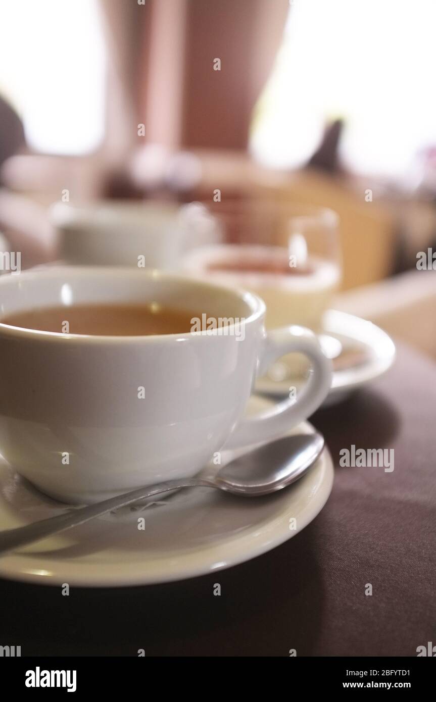 Cups of tea in cafe Stock Photo - Alamy