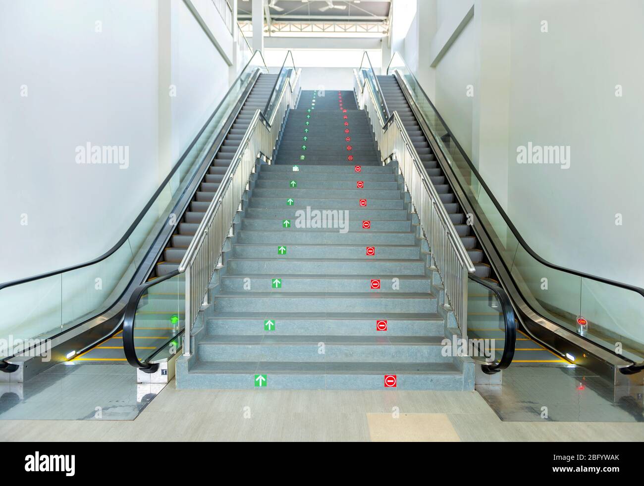 Escalator and stairs on the train station Stock Photo - Alamy