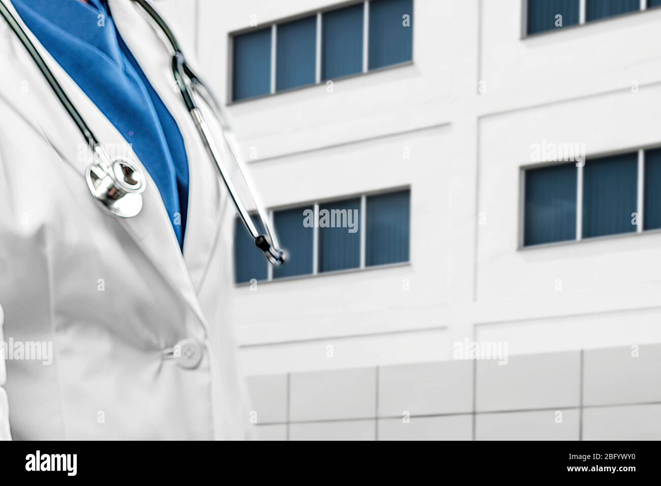 Doctor standing outside hospital hi-res stock photography and images ...