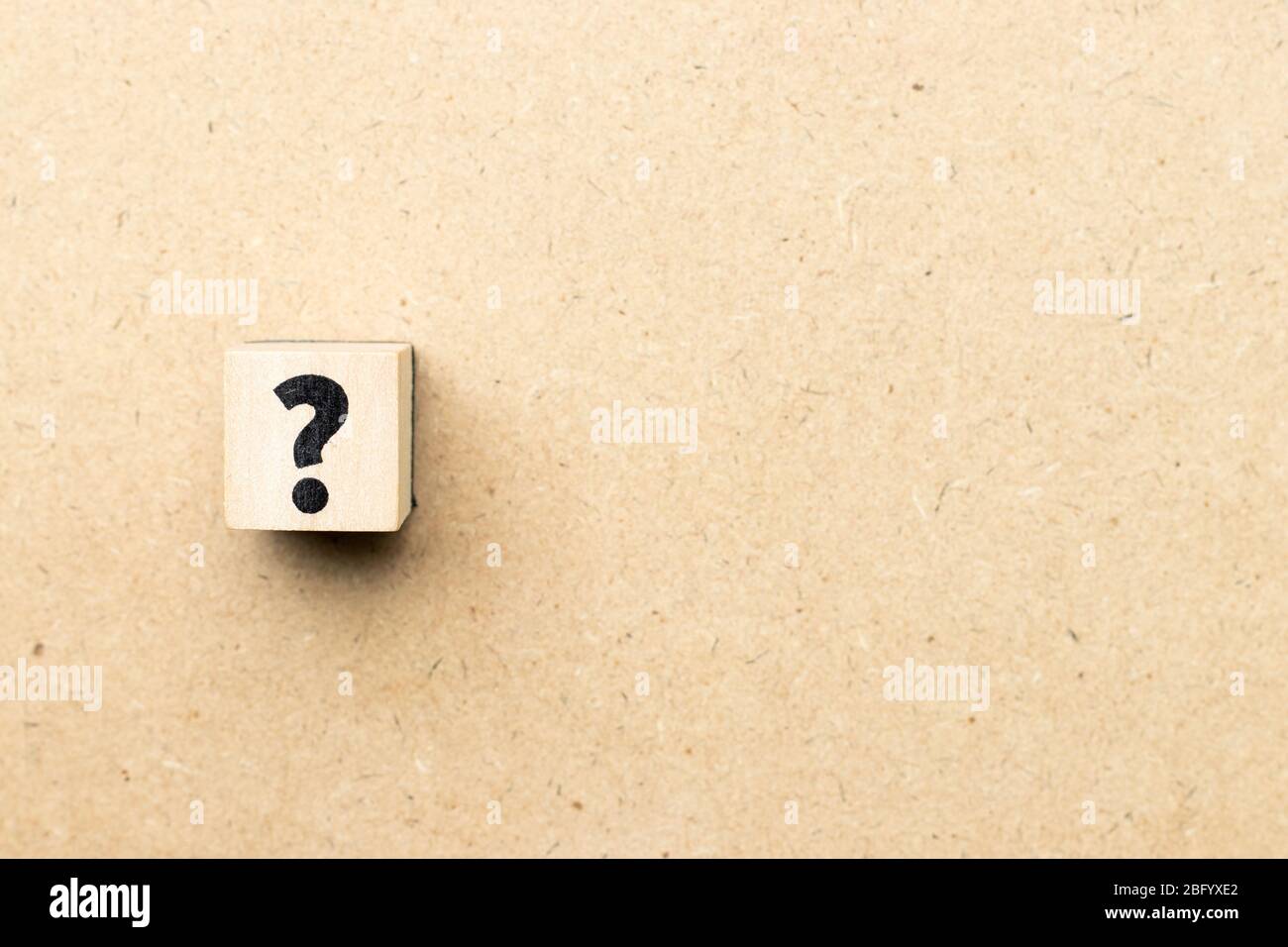 Alphabet letter block in question mark sign on wood background Stock ...