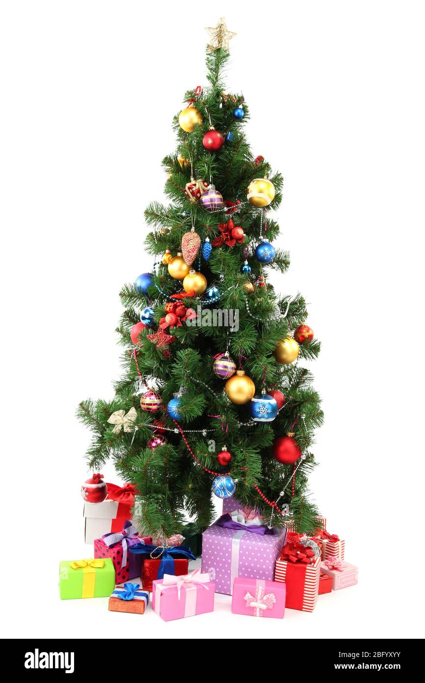 Decorated Christmas tree with gifts isolated on white Stock Photo - Alamy