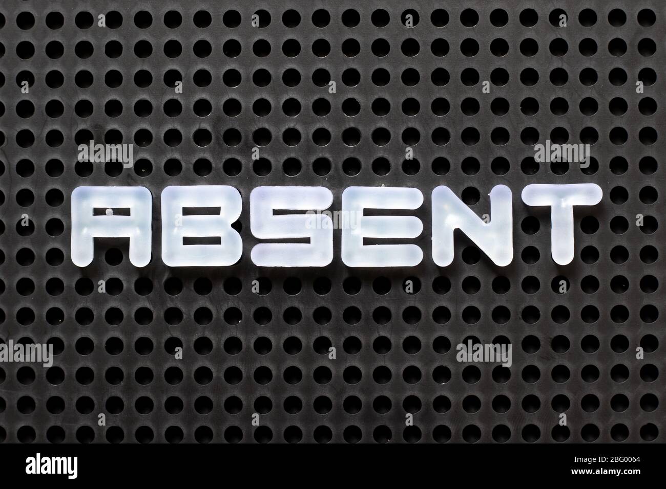 Black color pegboard with white letter in word absent Stock Photo - Alamy