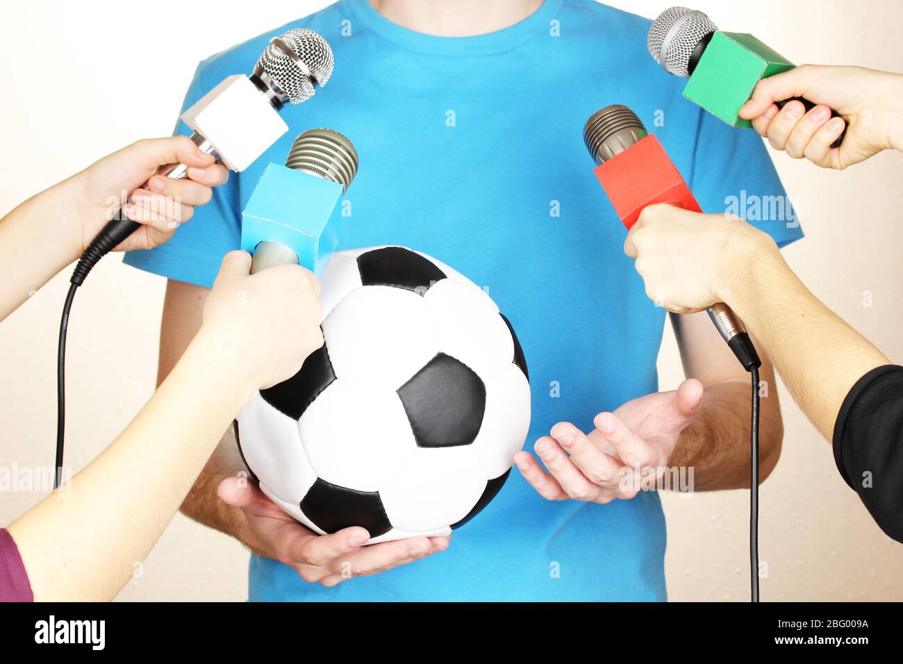 Conference meeting microphones and footballer Stock Photo - Alamy