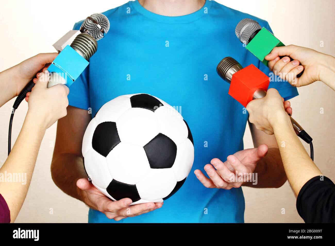 Conference meeting microphones and footballer Stock Photo - Alamy