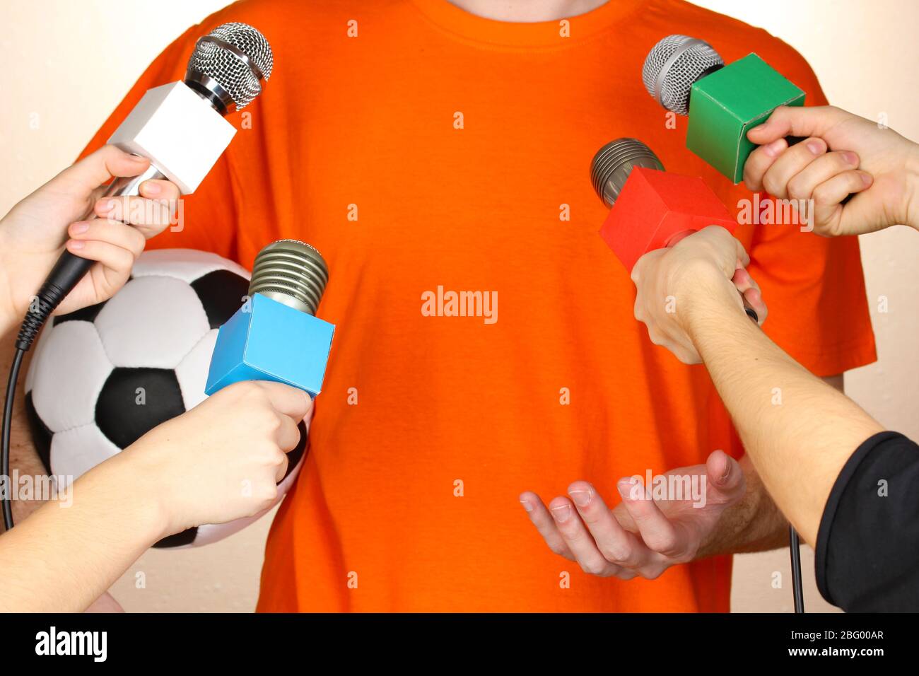 Conference meeting microphones and footballer Stock Photo - Alamy