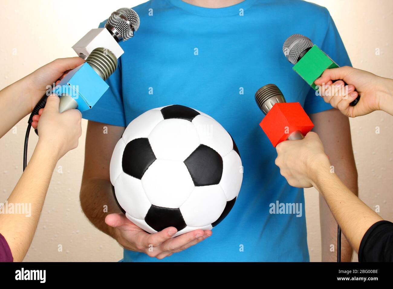 Conference meeting microphones and footballer Stock Photo - Alamy