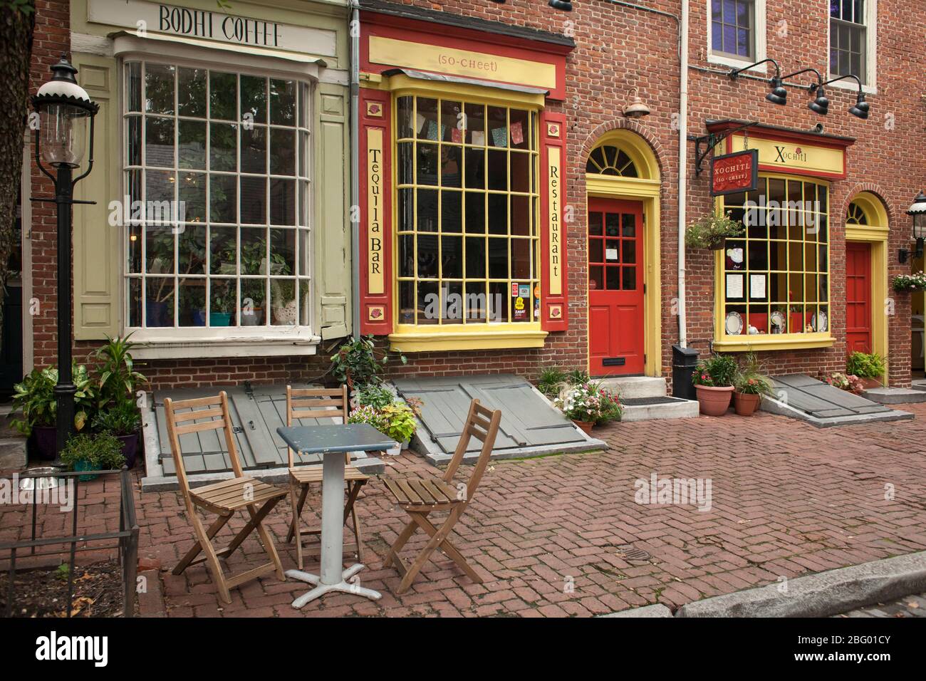 Horizontal view of some colorful cafes, restaurants and shops at Head ...