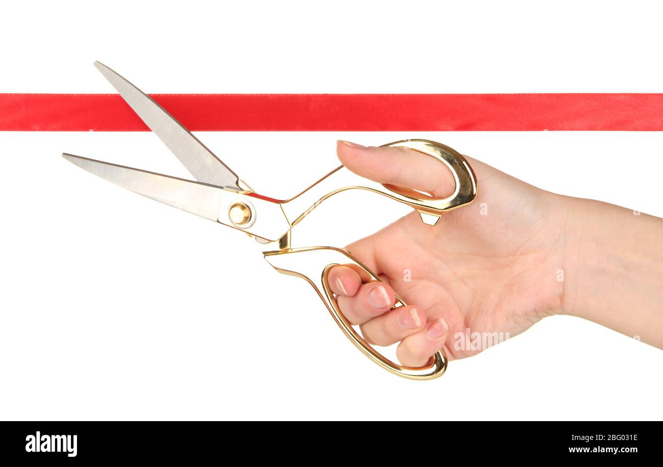 Cutting red ribbon isolated on white Stock Photo - Alamy
