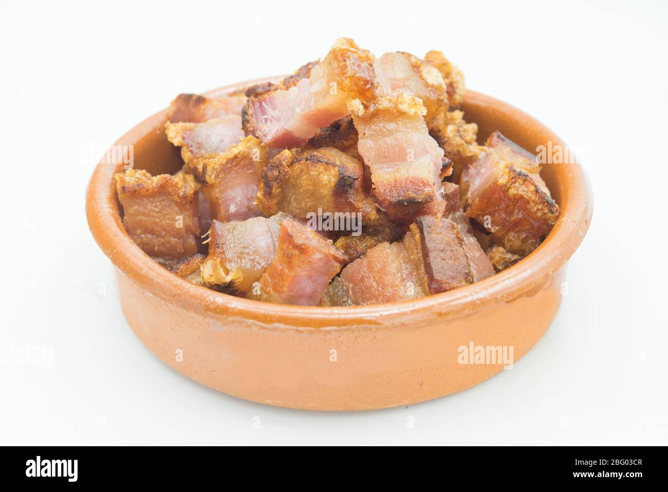 slice of bacon tapa typical spanish food Stock Photo - Alamy