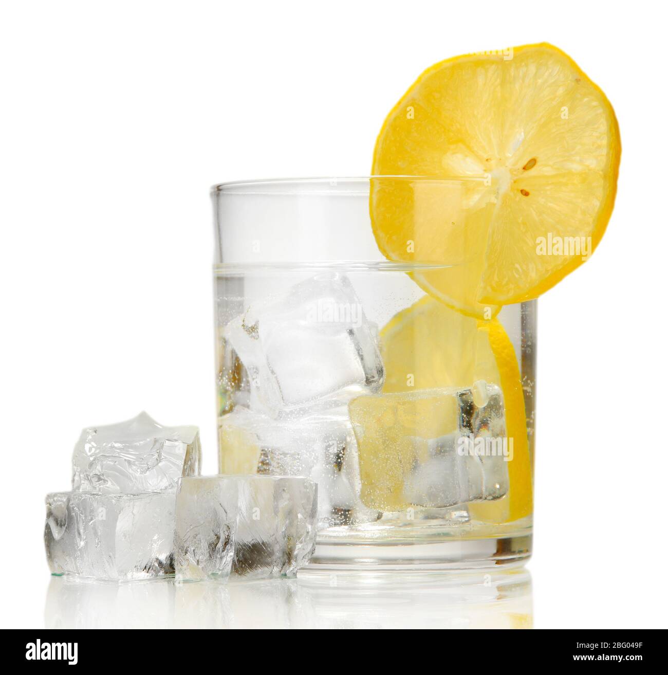 Ice cubes in glass with lemon isolated on white Stock Photo - Alamy