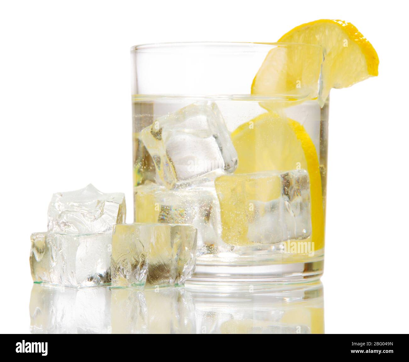 Ice cubes in glass with lemon isolated on white Stock Photo - Alamy