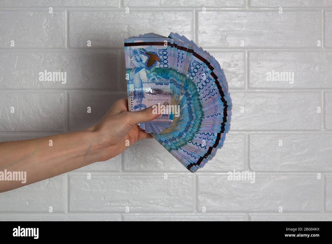 Kazakhstan tenge currency note sign hi-res stock photography and images ...