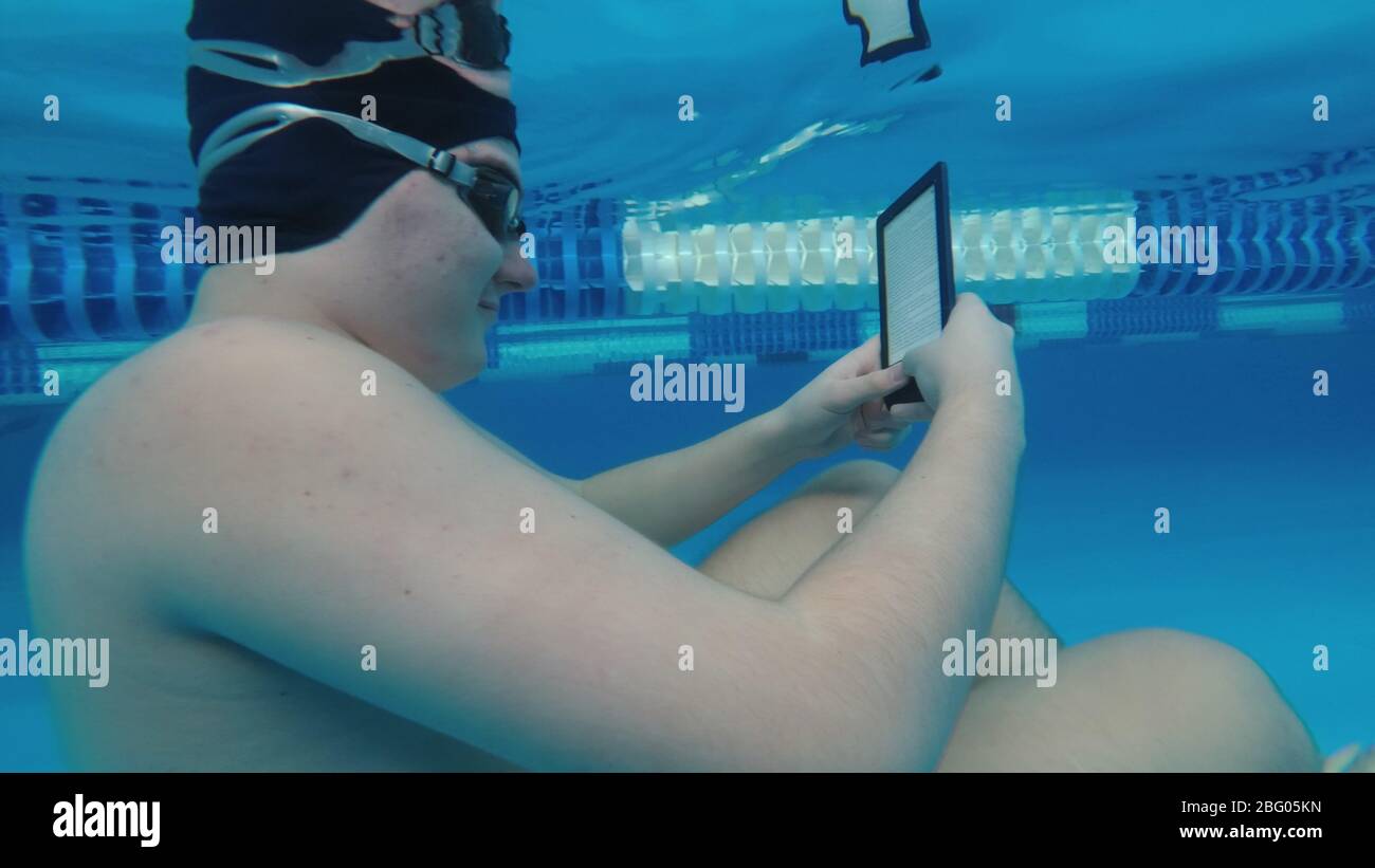 Reading Underwater High Resolution Stock Photography and Images - Alamy
