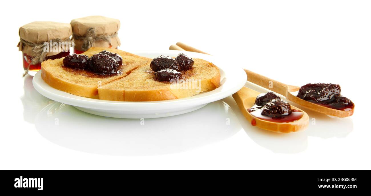 White bread toast with jam on plate, isolated on white Stock Photo - Alamy