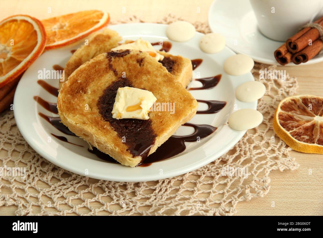 White bread toast with chocolate on wooden table Stock Photo - Alamy